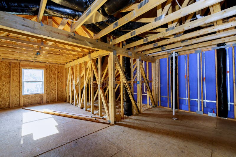 Unfinished House Construction with Wooden Framing Beams a Work in ...