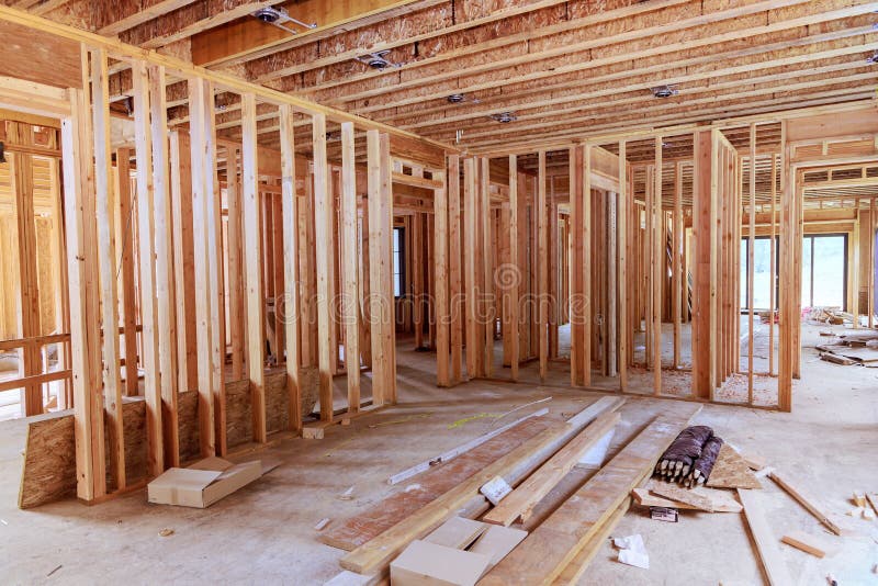 Unfinished Interior of Newly Constructed House with Stud a Beam Framing ...
