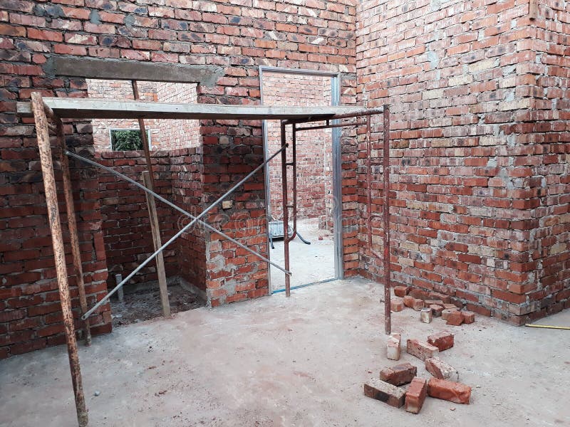 Unfinished Red Brick Single House Wall Under Construction. Stock Image ...