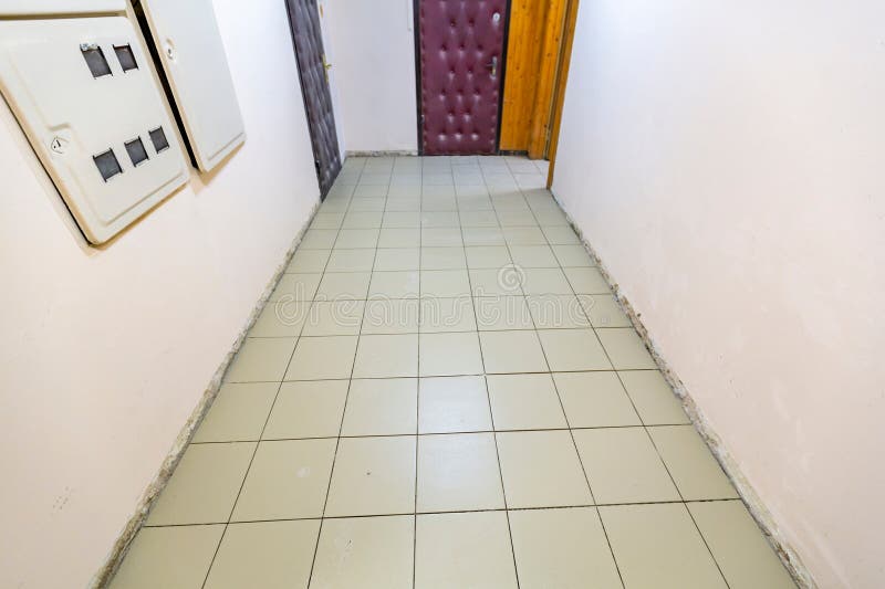 Unfinished Renovation of a Tile Floor in a Building Stock Photo - Image ...