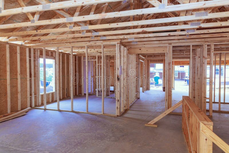 An Unfinished Residential Home Under Construction with Wood Framing a ...