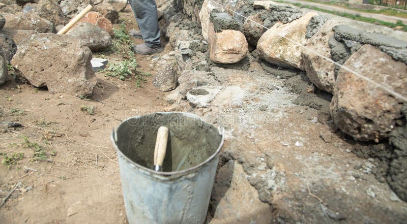 Unfinished Rough Stone Wall in Outdoor. Construction Stock Image ...