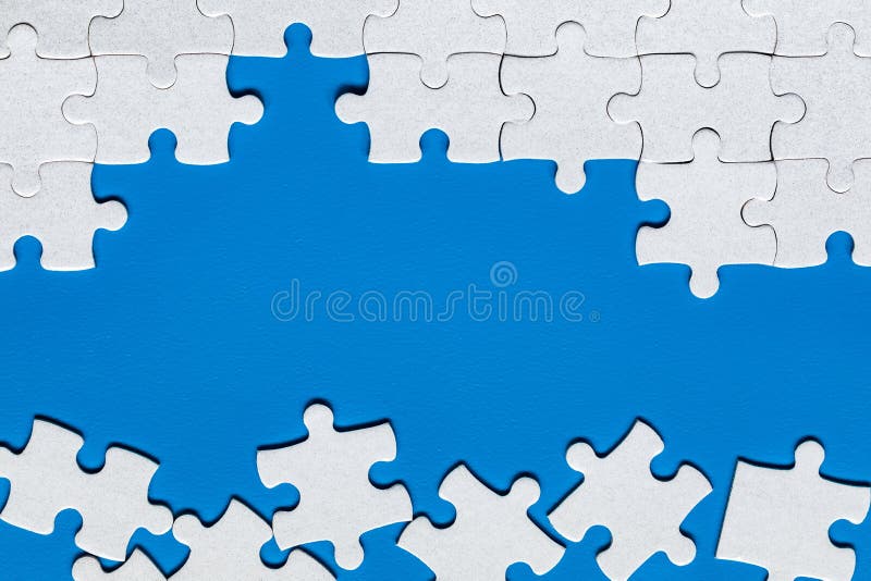 Unfinished White Jigsaw Puzzle Pieces. Fill in Pieces of the Jigsaw ...
