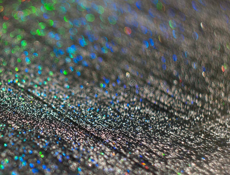The Unfocused Background of Color and Silver Luster on Black. Stock ...