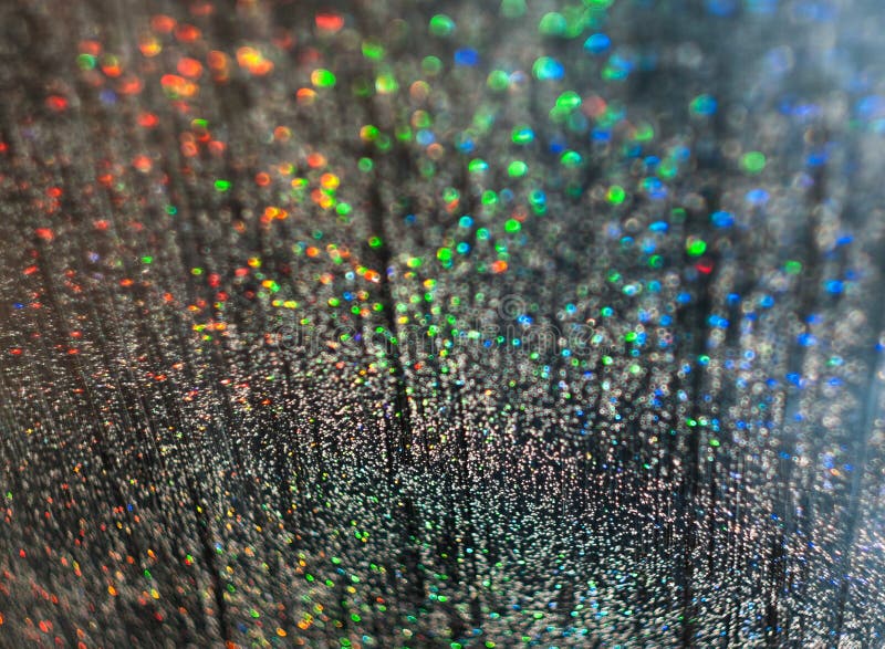 The Unfocused Background of Color and Silver Luster on Black. Stock ...