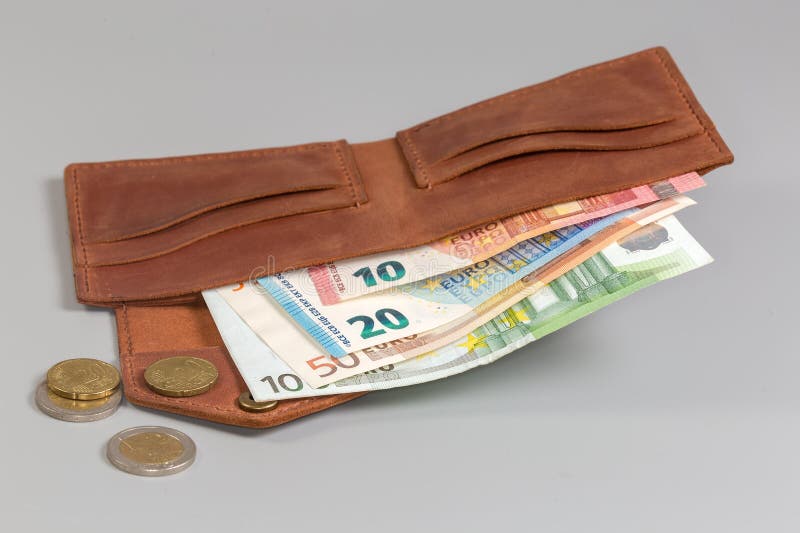 Unfolded Classic Brown Leather Wallet with Banknotes Inside and Coins ...