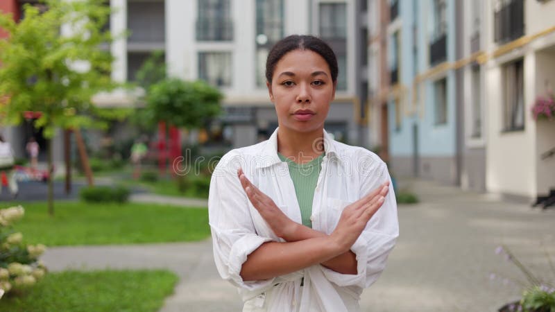Unhappy Angry African American Woman Gesturing Stop To The Camera