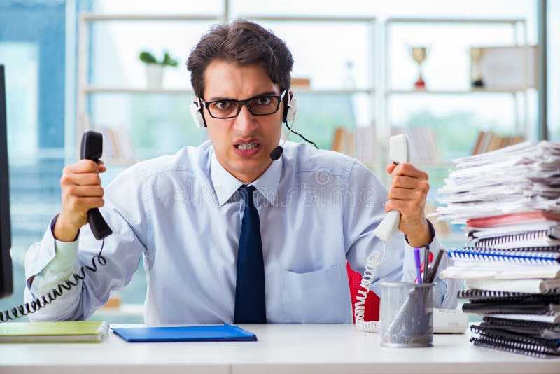 The Unhappy Angry Call Center Worker Frustrated with Workload Stock ...