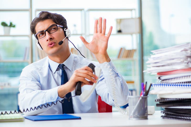The Unhappy Angry Call Center Worker Frustrated with Workload Stock ...
