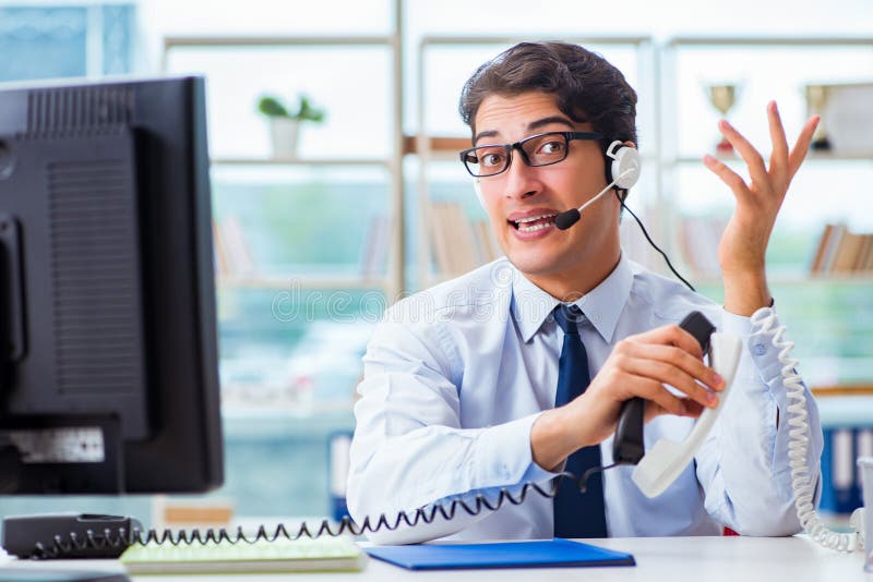 The Unhappy Angry Call Center Worker Frustrated with Workload Stock ...