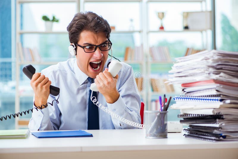 The Unhappy Angry Call Center Worker Frustrated with Workload Stock ...