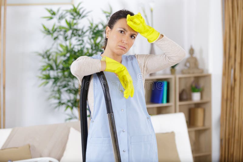 Unhappy Cleaner Tired from Hoovering Stock Photo - Image of interior ...