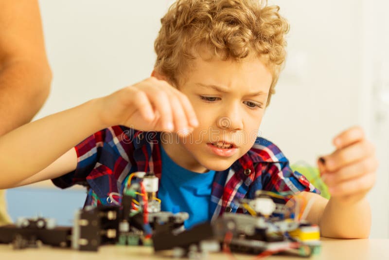 Unhappy Cute Boy Having Problems with Robot Construction Stock Image ...