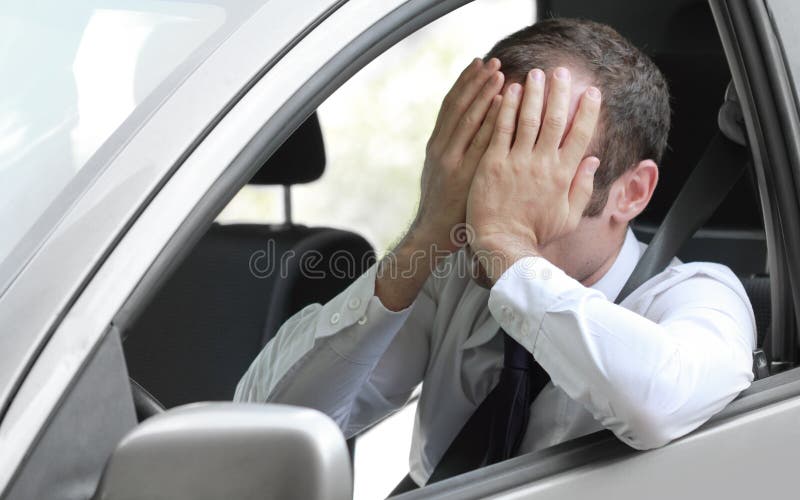 Unhappy driver in his car stock photo. Image of portrait - 71198318