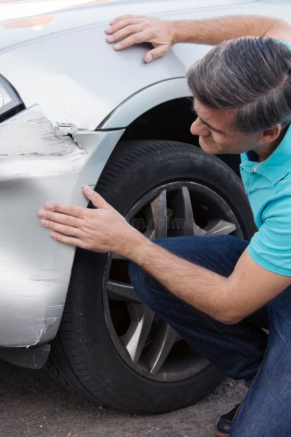 Unhappy Driver Inspecting Damage after Car Accident Stock Image - Image ...