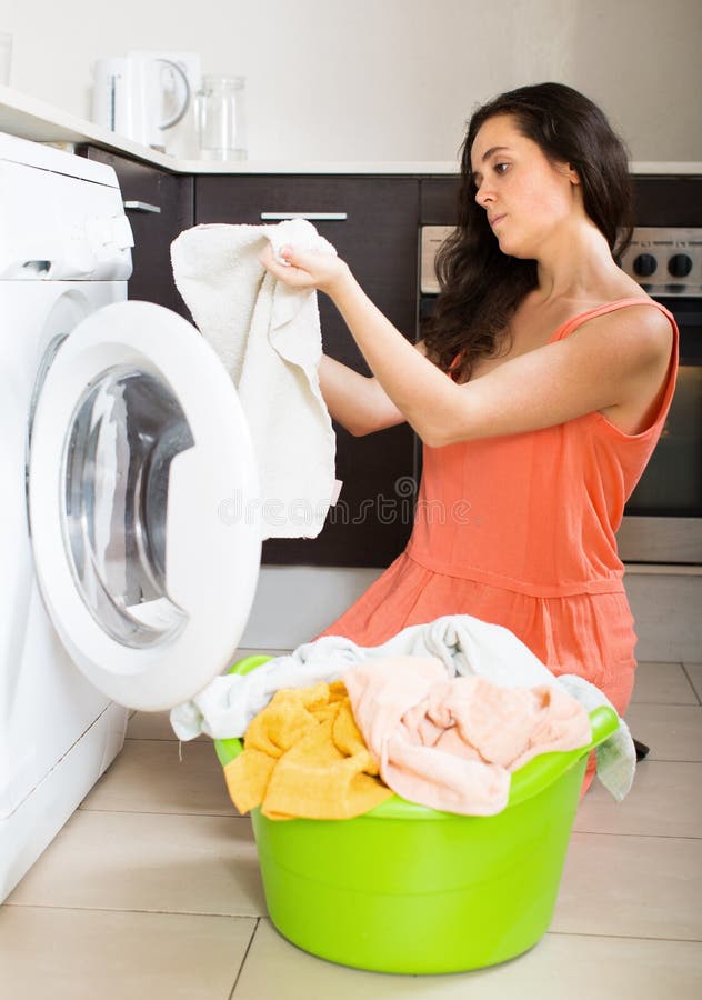 Unhappy Girl Using Washing Machine at Home Stock Photo - Image of ...