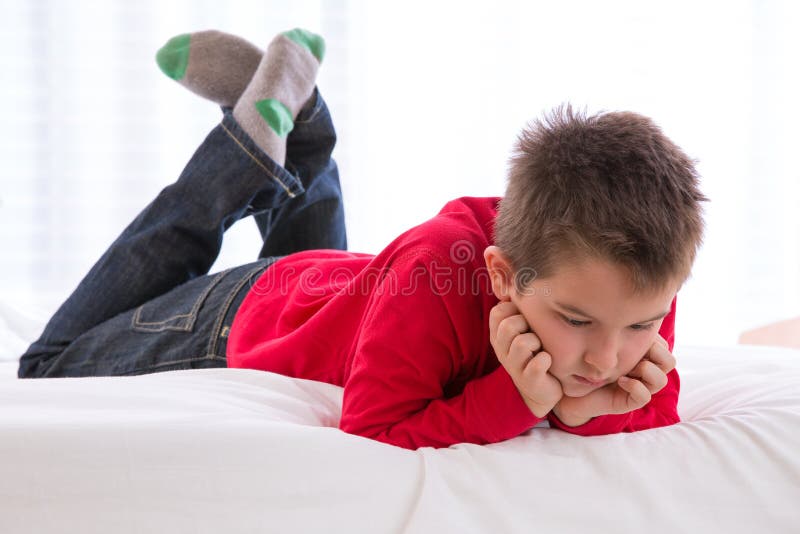 Unhappy Kid Looking Down stock photo. Image of emotion - 34943184