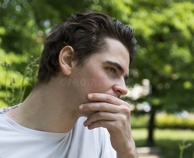 Unhappy, Sad Young Man Outdoors in Park Thinking Stock Photo - Image of ...