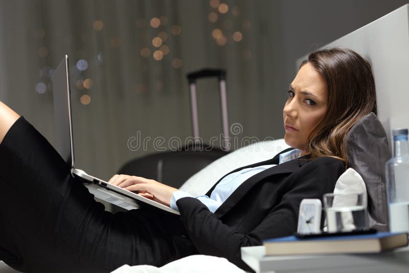 Unhappy Worker Working Late Hours in an Hotel Room Stock Image - Image ...