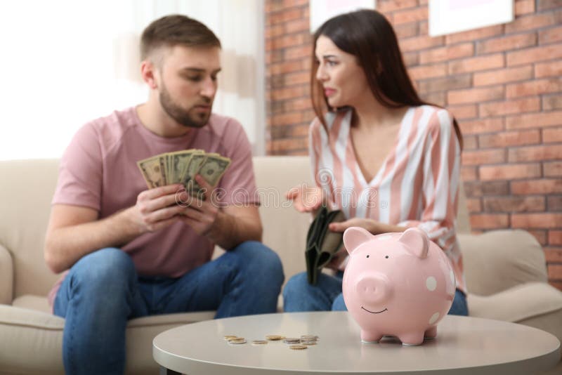 Unhappy Young Couple with Money. Financial Problems Stock Photo - Image ...