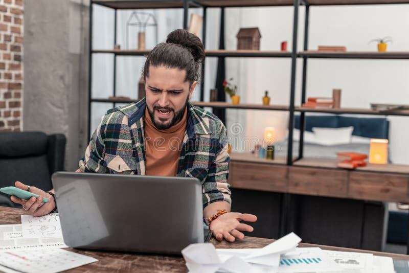 Unhappy Young Man Having Problem with Work Stock Photo - Image of ...