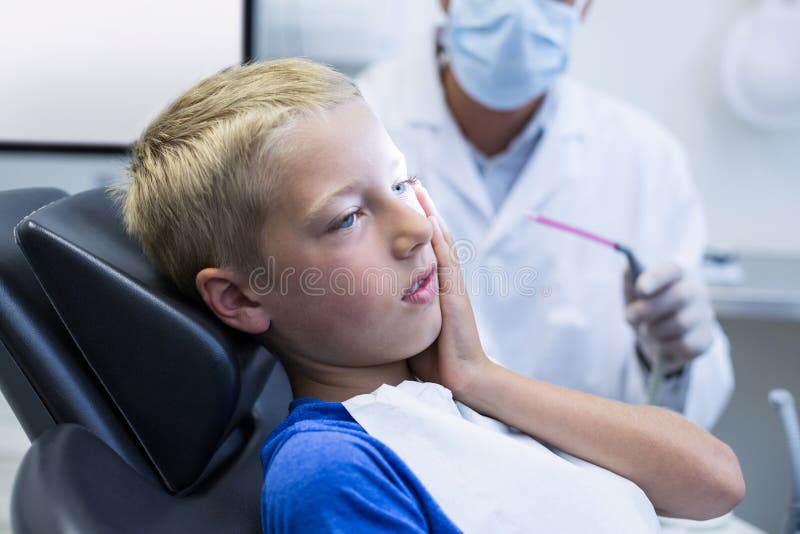 Unhappy Young Patient Having a Toothache Stock Photo - Image of indoors ...