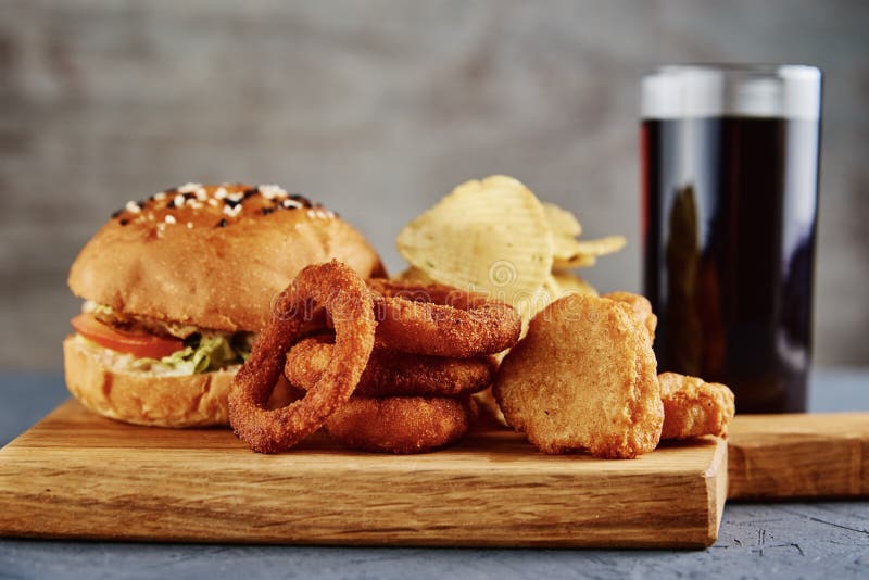 Unhealthy and Junk Food. Different Types of Fast Food on the Table ...