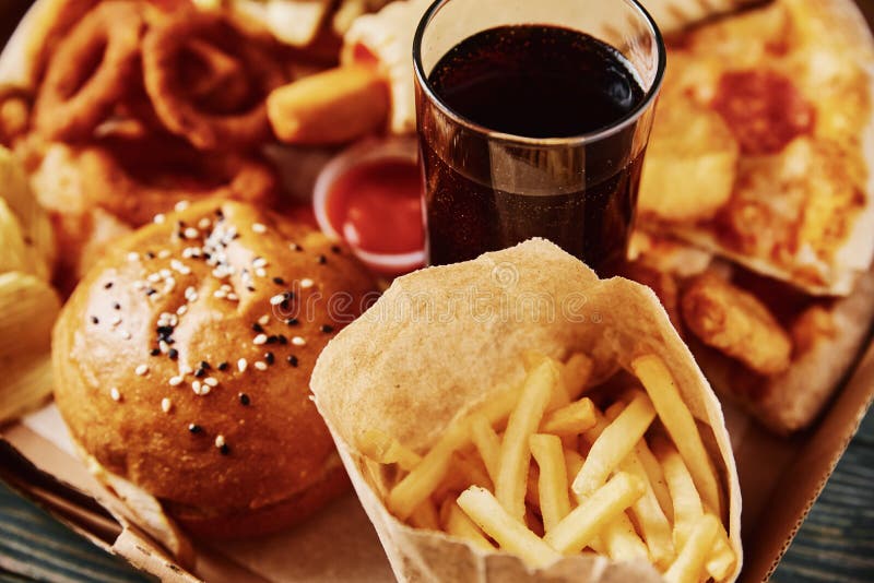 Unhealthy and Junk Food. Different Types of Fast Food on the Table ...
