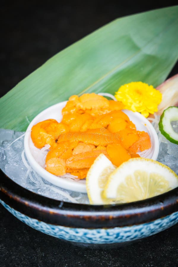 Uni sashimi stock photo. Image of orange, bafun, green - 93267374