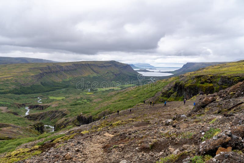 Unidentifiable Hikers on the Vast Section of the Glymur Waterfall Trail ...