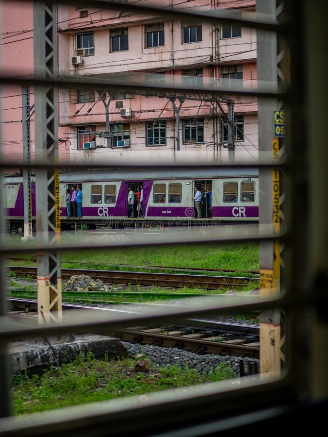 Unidentified Passengers Standing on the Doors of Running Local Train ...