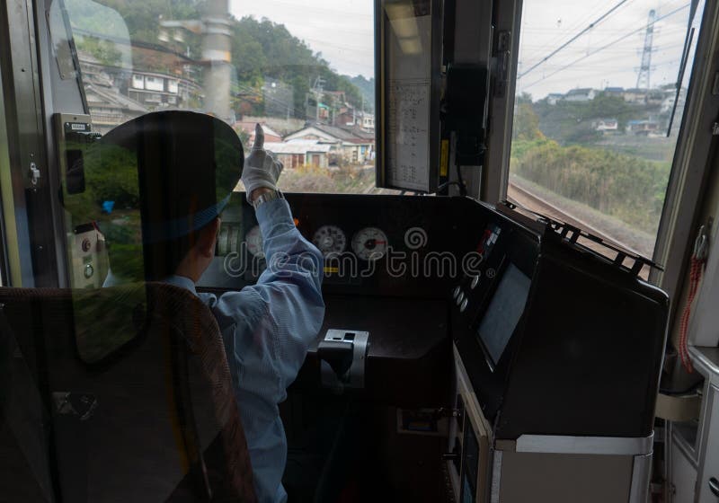 Unidentified Train Driver Points at Warning Lights in Osaka Editorial ...