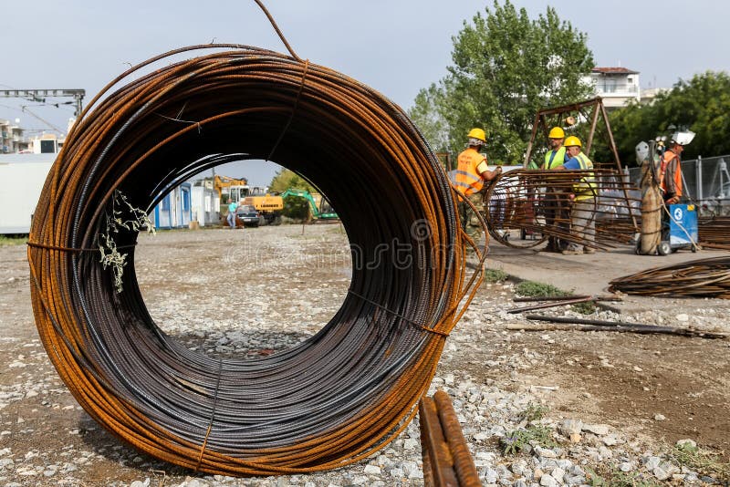 Unidentified Workers Working with Concrete Iron at a Construction Site ...
