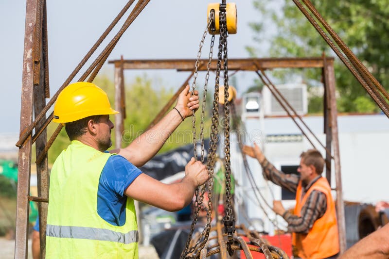Unidentified Workers Working with Concrete Iron at a Construction Site ...