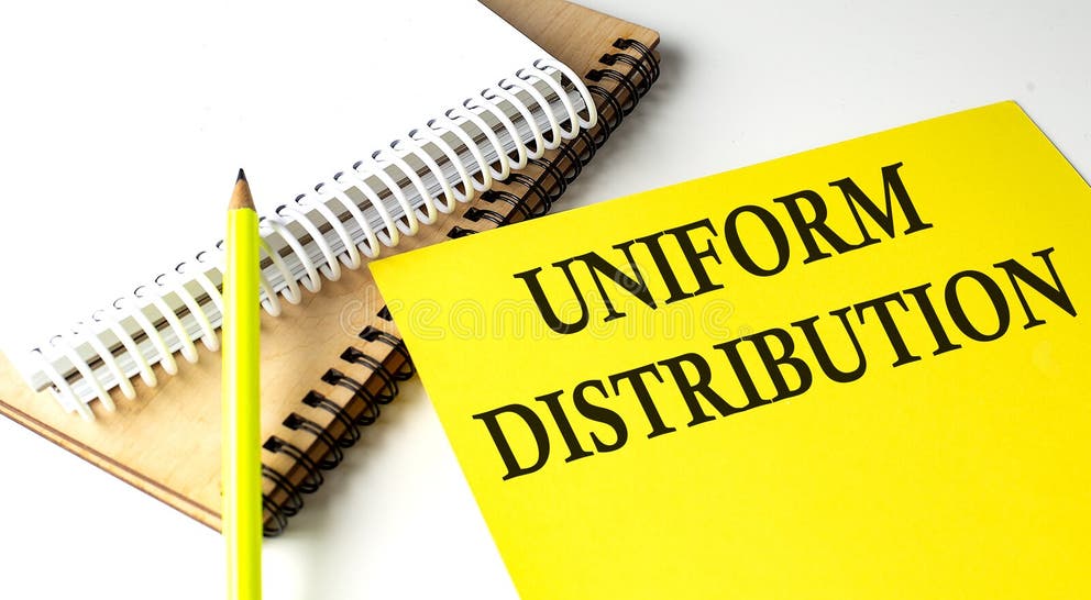 UNIFORM DISTRIBUTION Text Written on a Yellow Paper with Notebook Stock ...