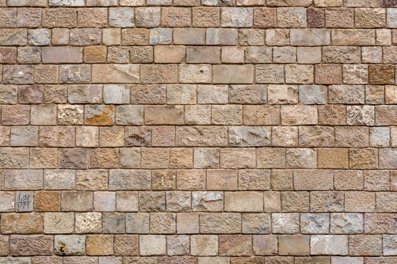 Uniform natural stone wall stock image. Image of blocks - 362947491