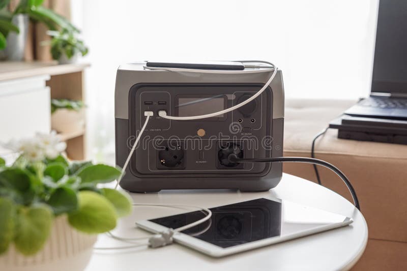 Uninterruptible Power Supply Source. Workspace on Sofa with Laptop ...