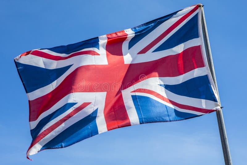 Union Flag Over a Clear Blue Sky Stock Image - Image of england ...