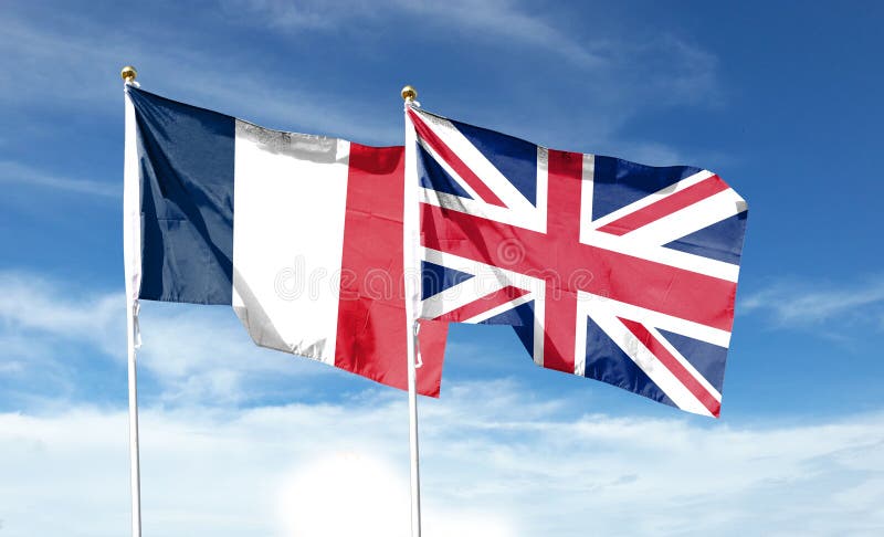 Union Jack and French Flag on Cloudy Sky. Waving in the Sky Stock ...