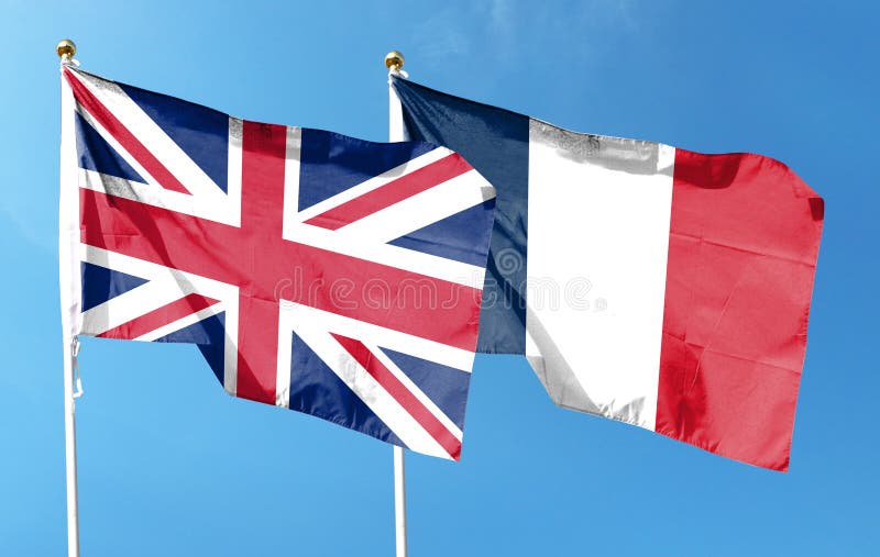 Union Jack and French Flag on Cloudy Sky. Waving in the Sky Stock Photo ...