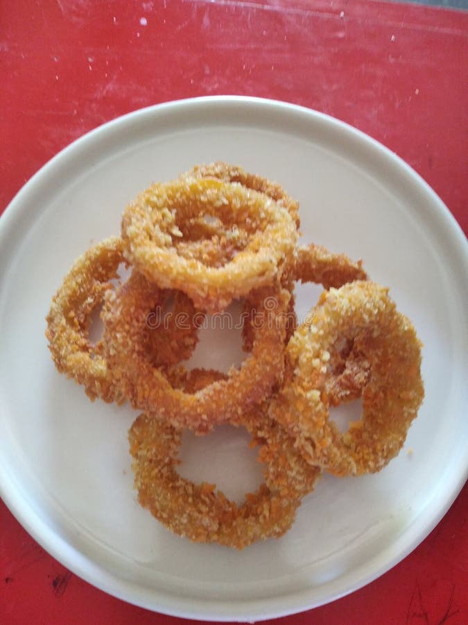 Union rings crispy stock photo. Image of cuisine, vegetable - 223523974