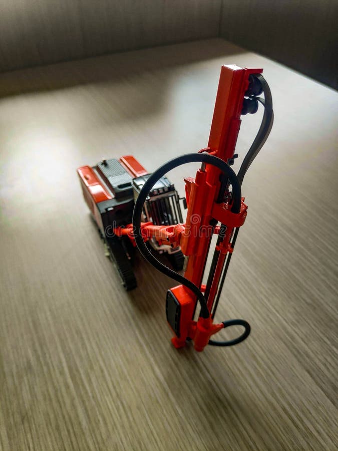 A Unique Angle of a Red Drilling Machine Model Stock Photo - Image of ...