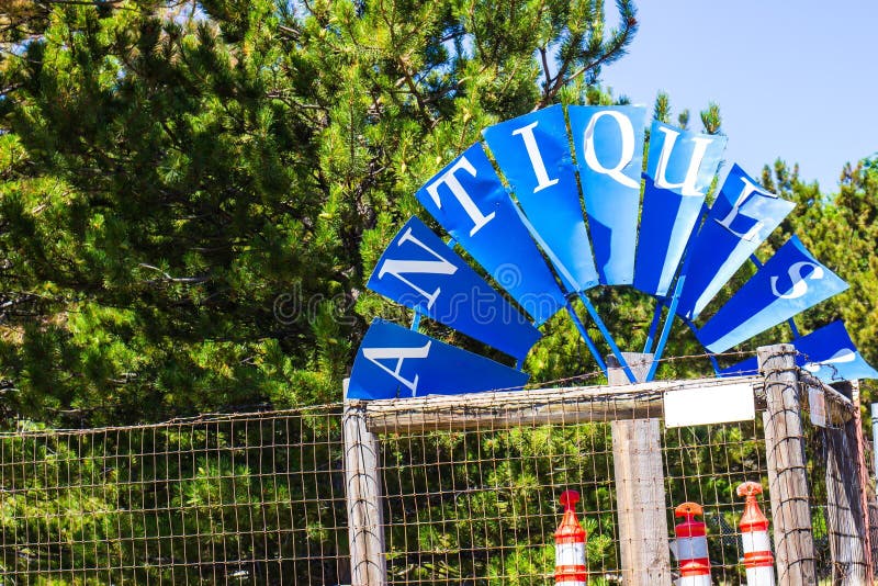 Unique Antique Sign on Old Half Windmill Blades Stock Photo - Image of ...