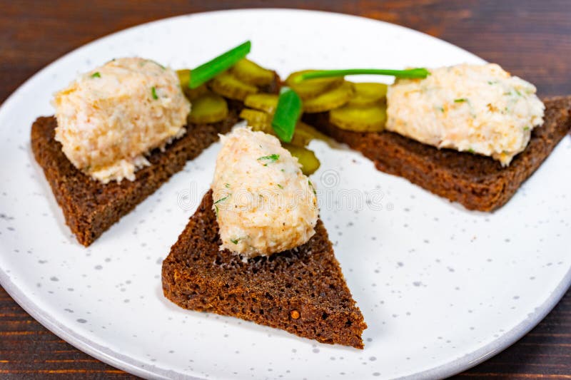 Unique Appetizer Featuring Rye Bread and Creamy Spread with Pickles ...