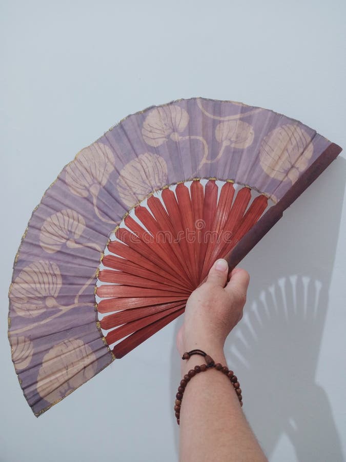 Unique bamboo hand fan stock image. Image of beautiful - 339798731