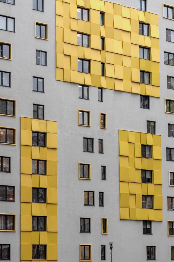 Unique Building Facade with Yellow Panels and Windows for Modern ...
