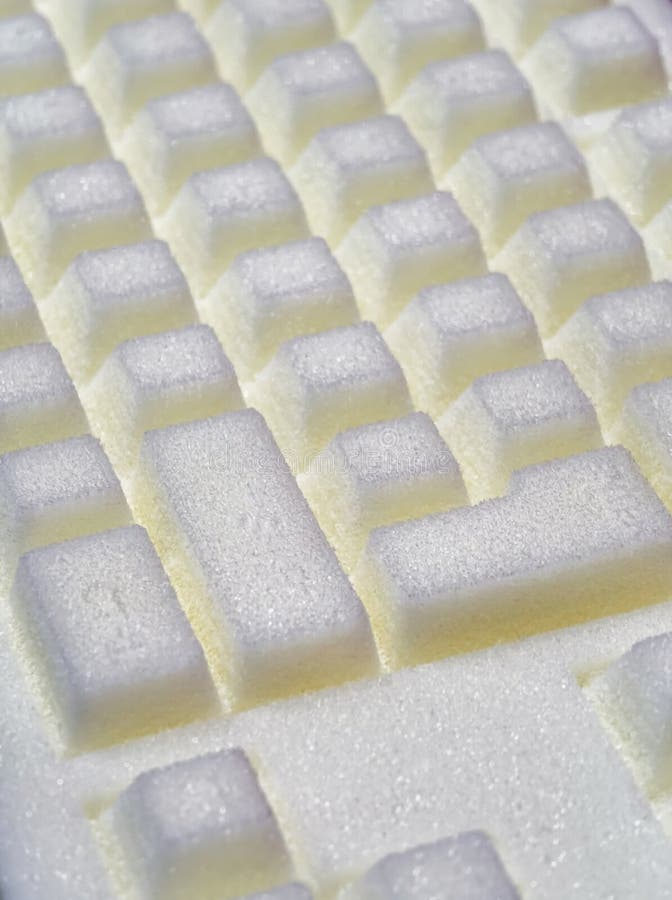 Unique Close-up View of a Textured Foam Keyboard with Distinct Keys ...