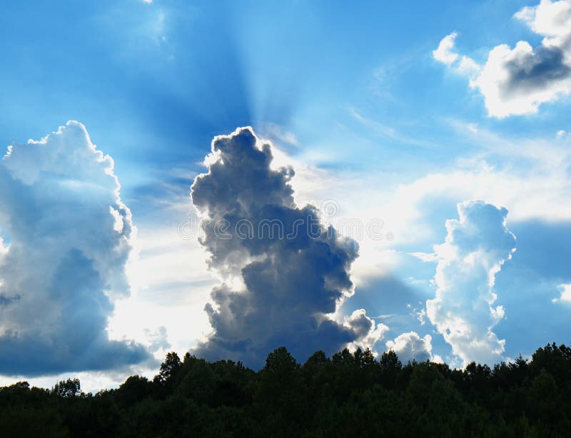 Sunlight Streaming through a Cloud. Stock Image - Image of weather ...