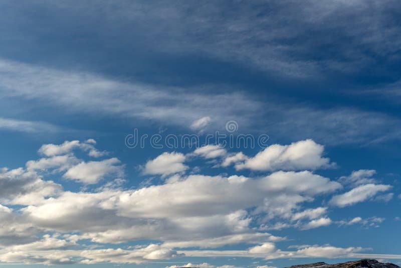 Unique Cloud Pattern Forming Over the Landscape of Our World Stock ...