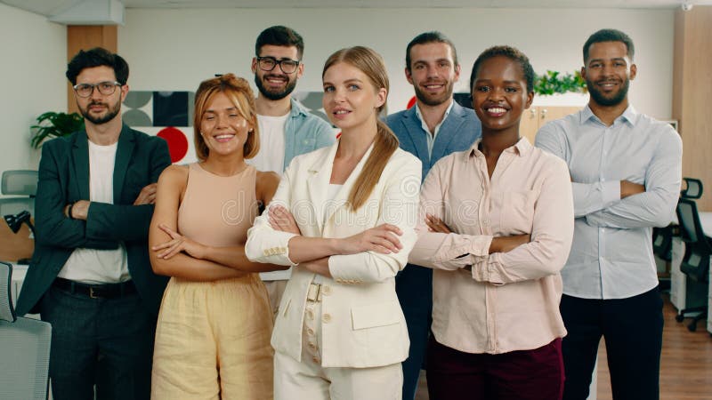 A Unique and Different Group of Seven Workers are Standing in a ...